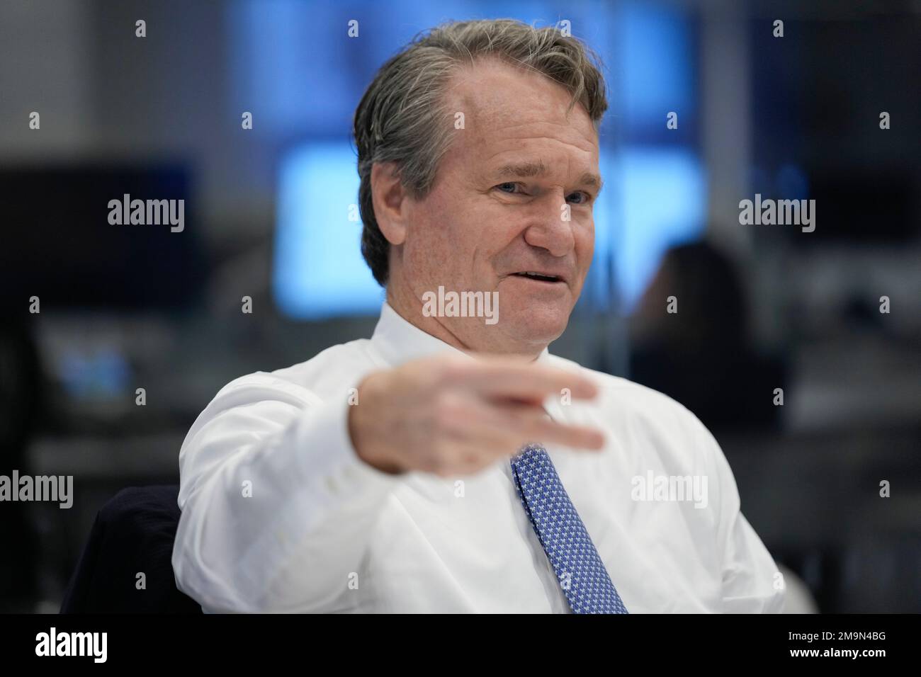 Brian Moynihan, CEO of Bank of America, talks with reporters at ...