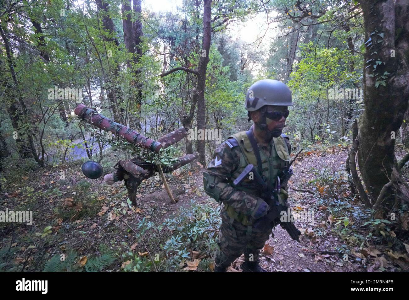 An Indian army soldier displays trap lane or booby traps working in a ...