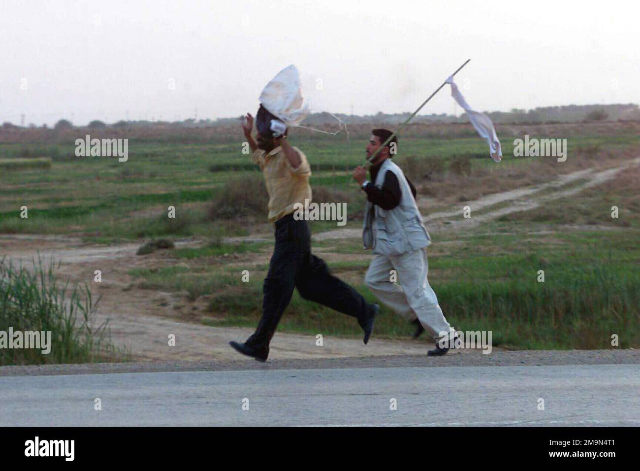 As US Marine Corps (USMC) elements move along the road to Baghdad ...