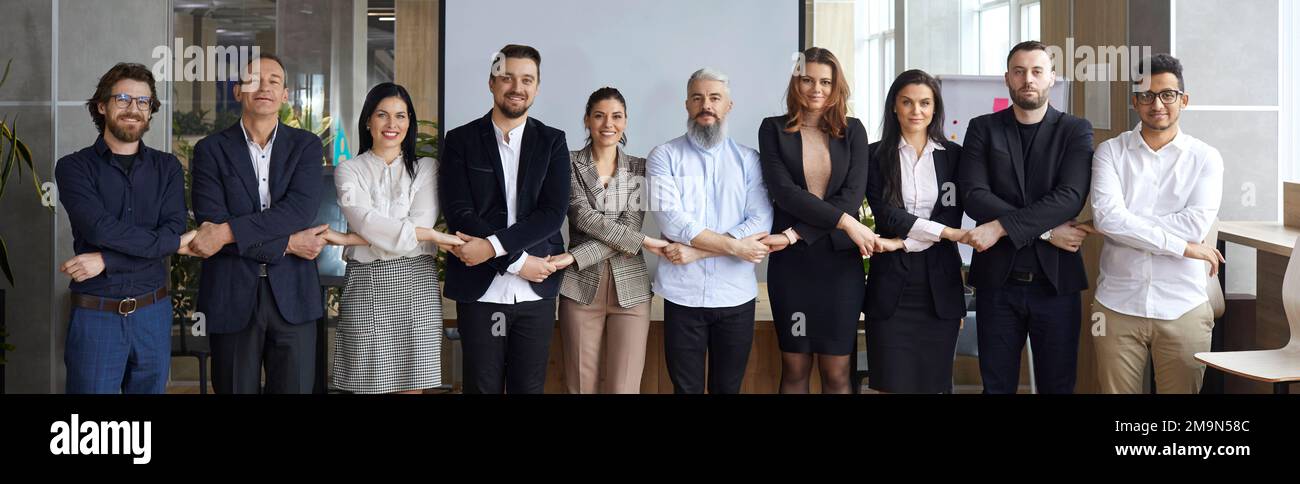 Group business people holding hands hi-res stock photography and images - Alamy