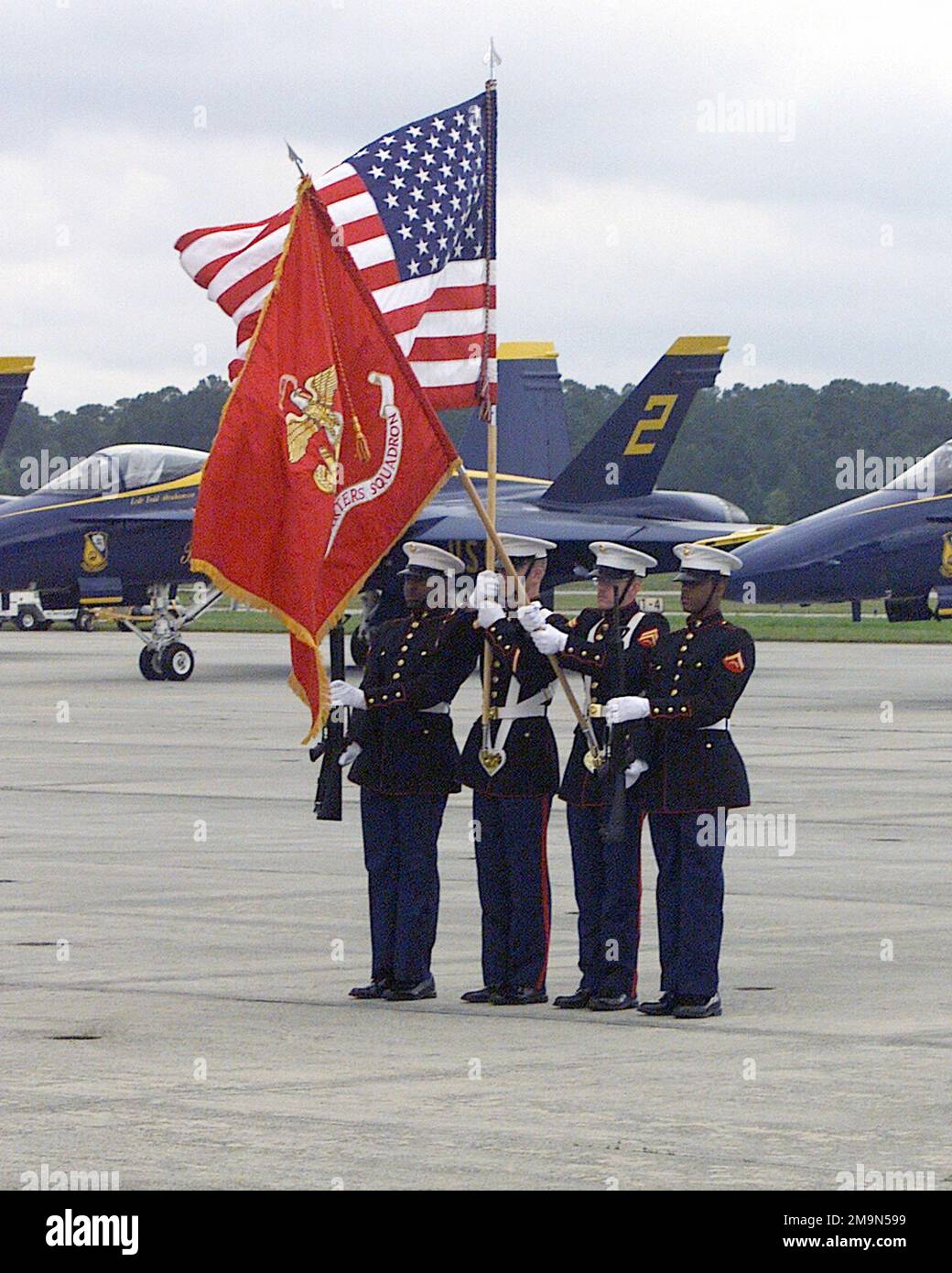A US Marine Corps (USMC) Color Guard presents the Colors at the opening ...