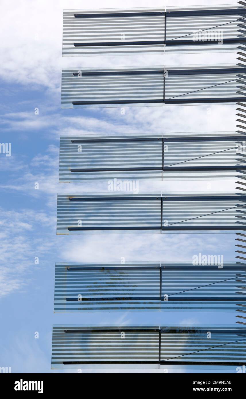 The abstract view of a modern exterior of an educational building in ...