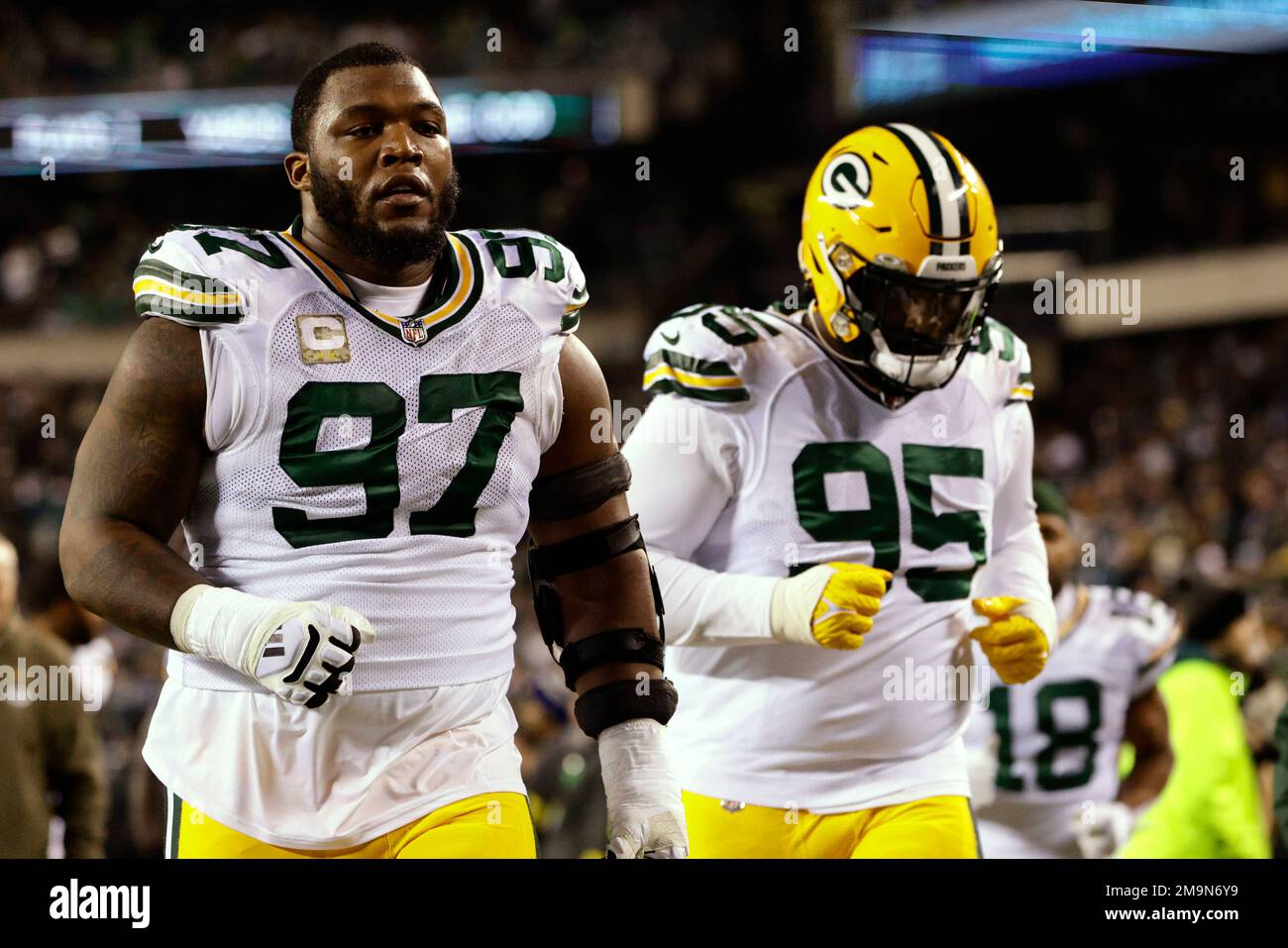 Green Bay Packers defensive tackles Kenny Clark (97) and Devonte Wyatt ...