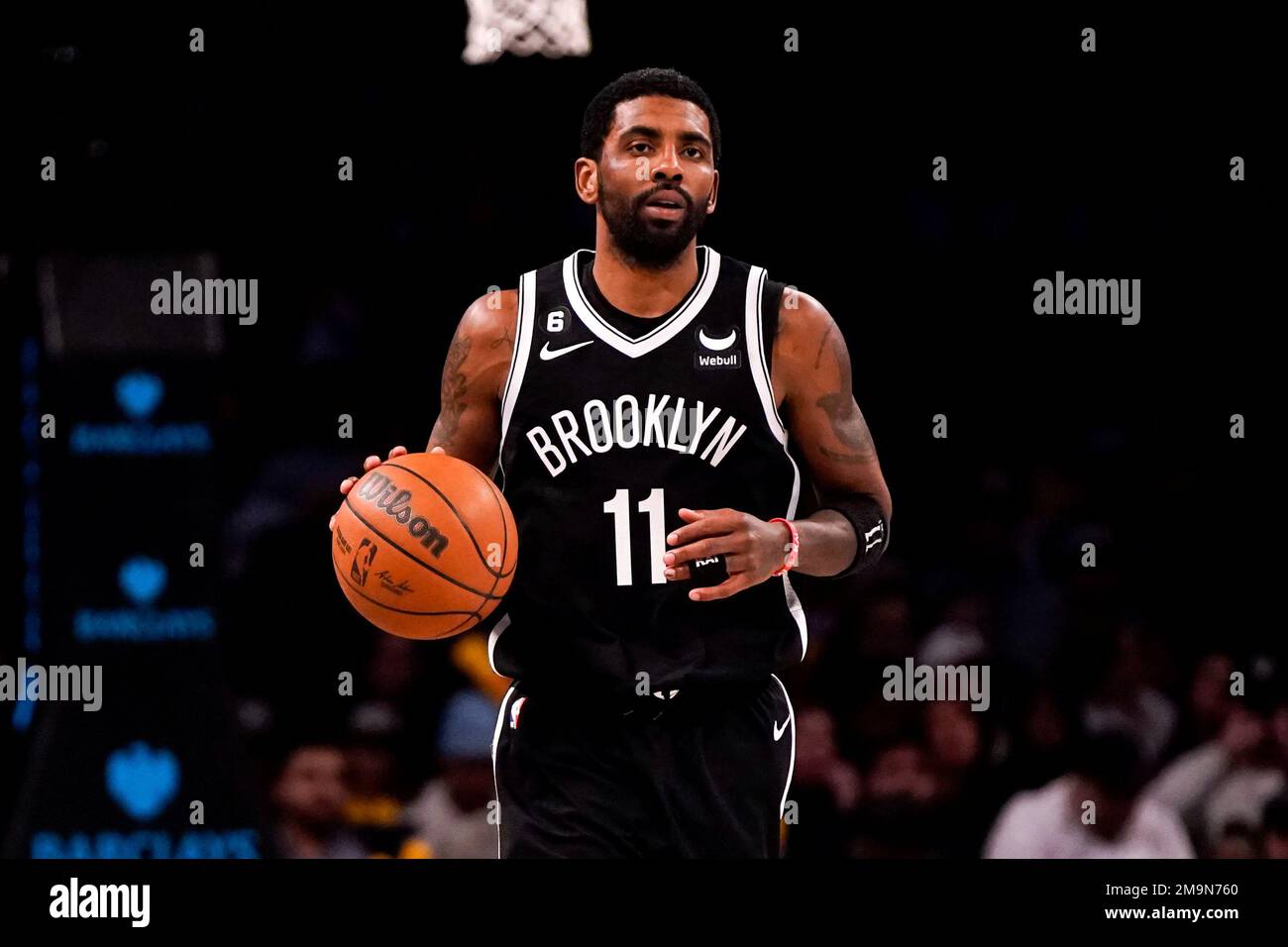 Brooklyn Nets guard Kyrie Irving (11) dribbles the ball during the ...