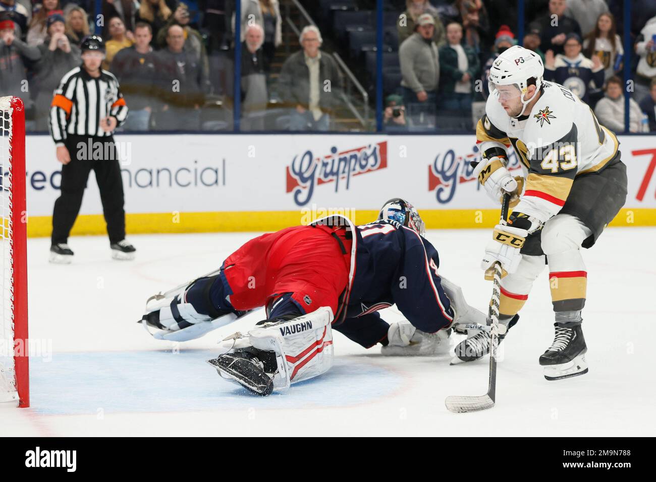 Vegas Golden Knights' Paul Cotter, right, scores against Columbus Blue ...