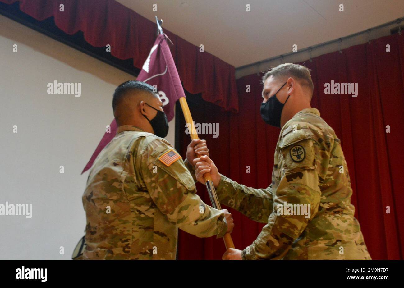 Capt. Deriek D. France, takes the unit guidon from Lt. Col. Daniel T ...