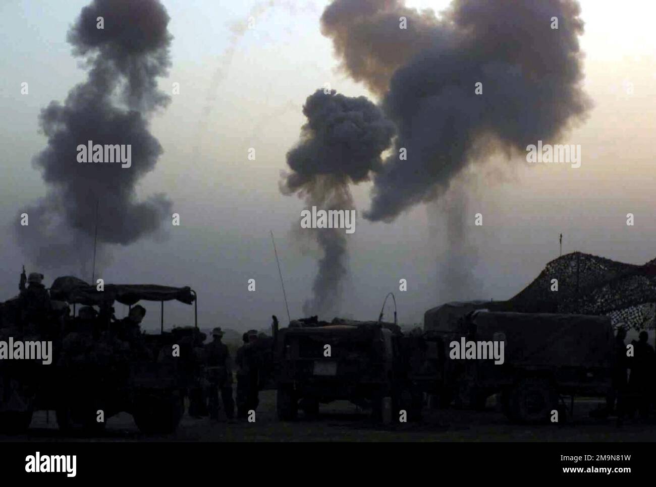 Demolition plumes of enemy munitions at A'Namaneah, Iraq, by an ...