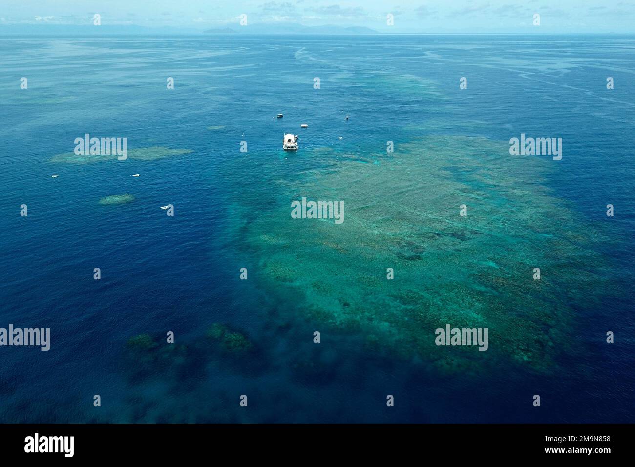 FILE - The Remoora pontoon, owned by Reef Magic, sits above the Moore ...