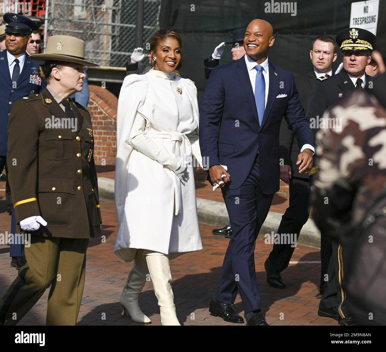 Gov. Wes Moore with his wife, Dawn, make their way up the walkway of ...