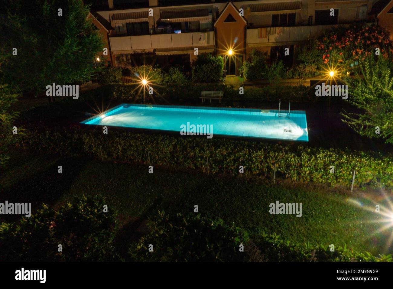An empty swimming pool in the backyard Stock Photo - Alamy