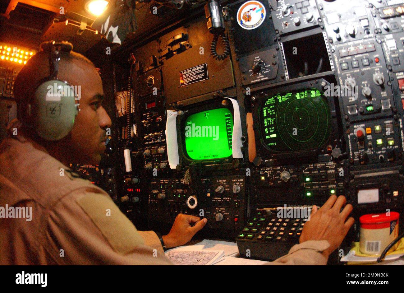 Over Iraqi skies, a US Air Force (USAF) Radar Navigator monitors the ...