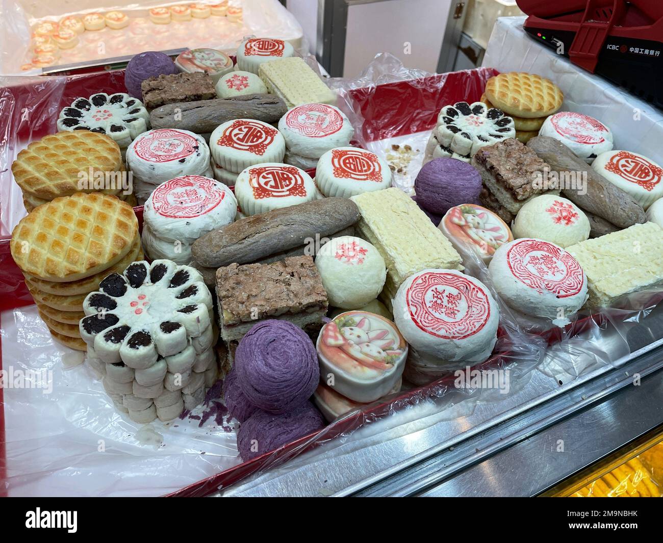 Two new year gift boxes of traditional pastries appear at a bakery in ...
