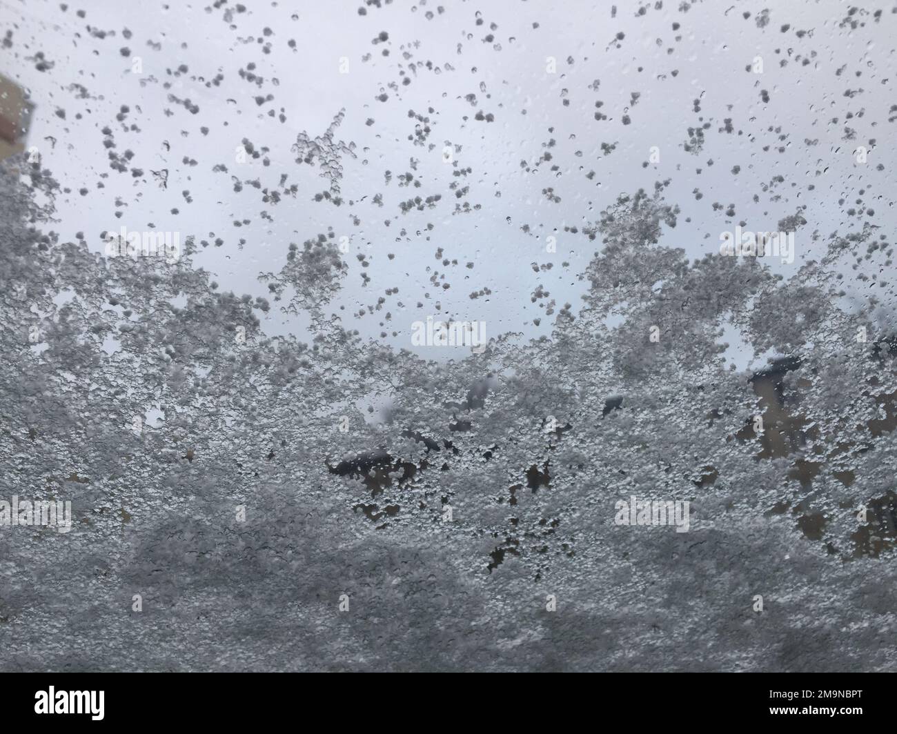 Texture of frozen drops and snow on frosted glass. Abstract textured ...