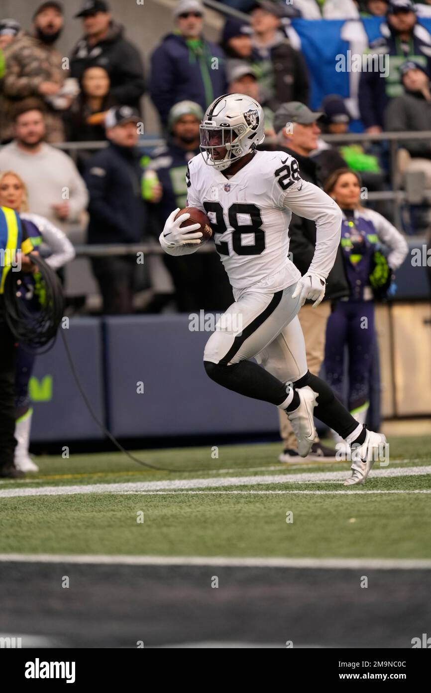Las Vegas Raiders running back Josh Jacobs (28) scores a touchdown ...