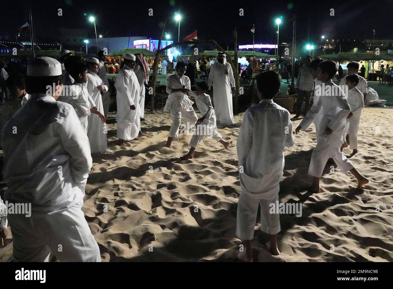 Youth practice wrestling in Katara beach, Doha, Qatar, Monday, Nov. 28 ...