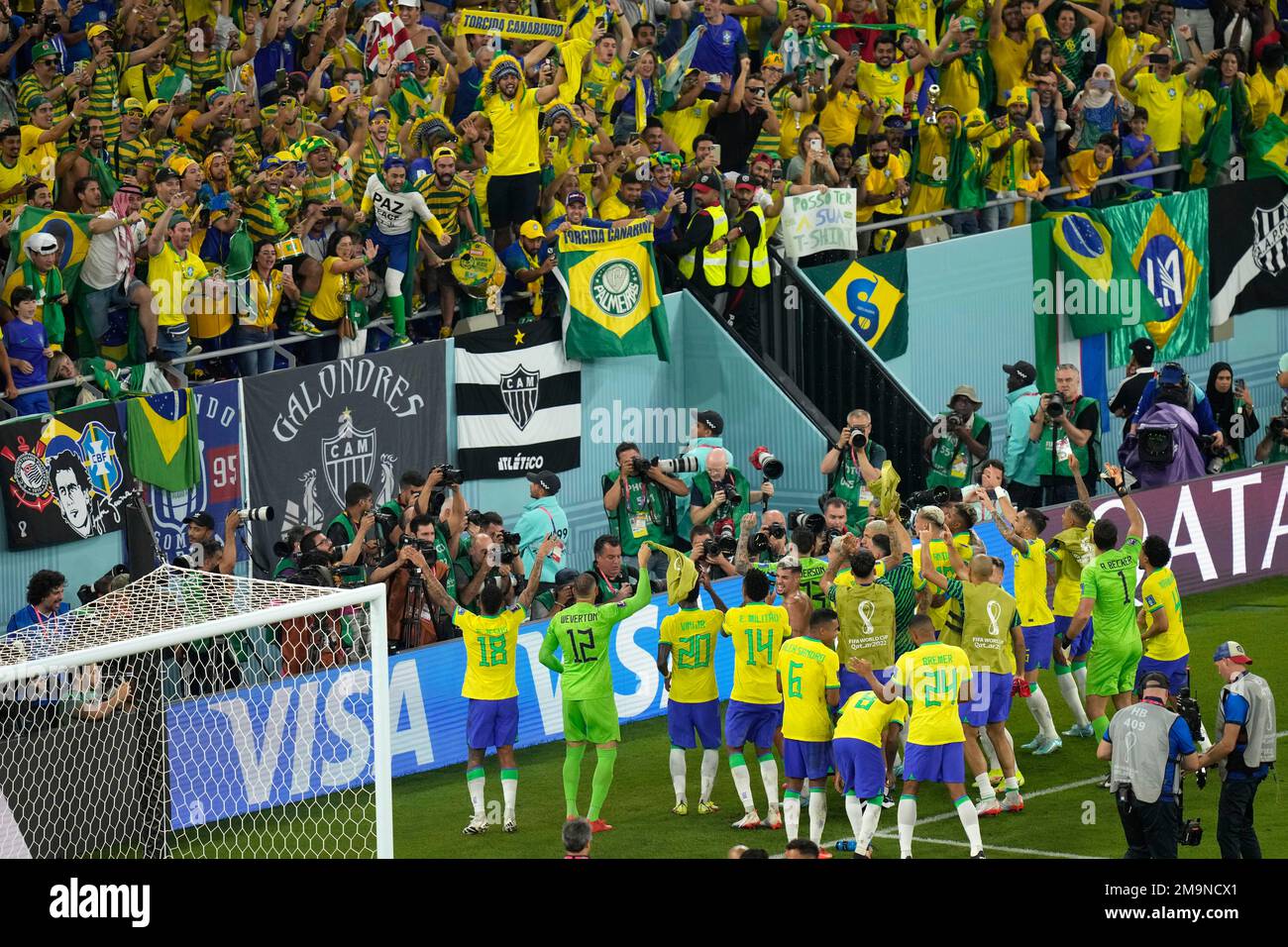 Brazil's players celebrate at the end of the World Cup group G soccer ...