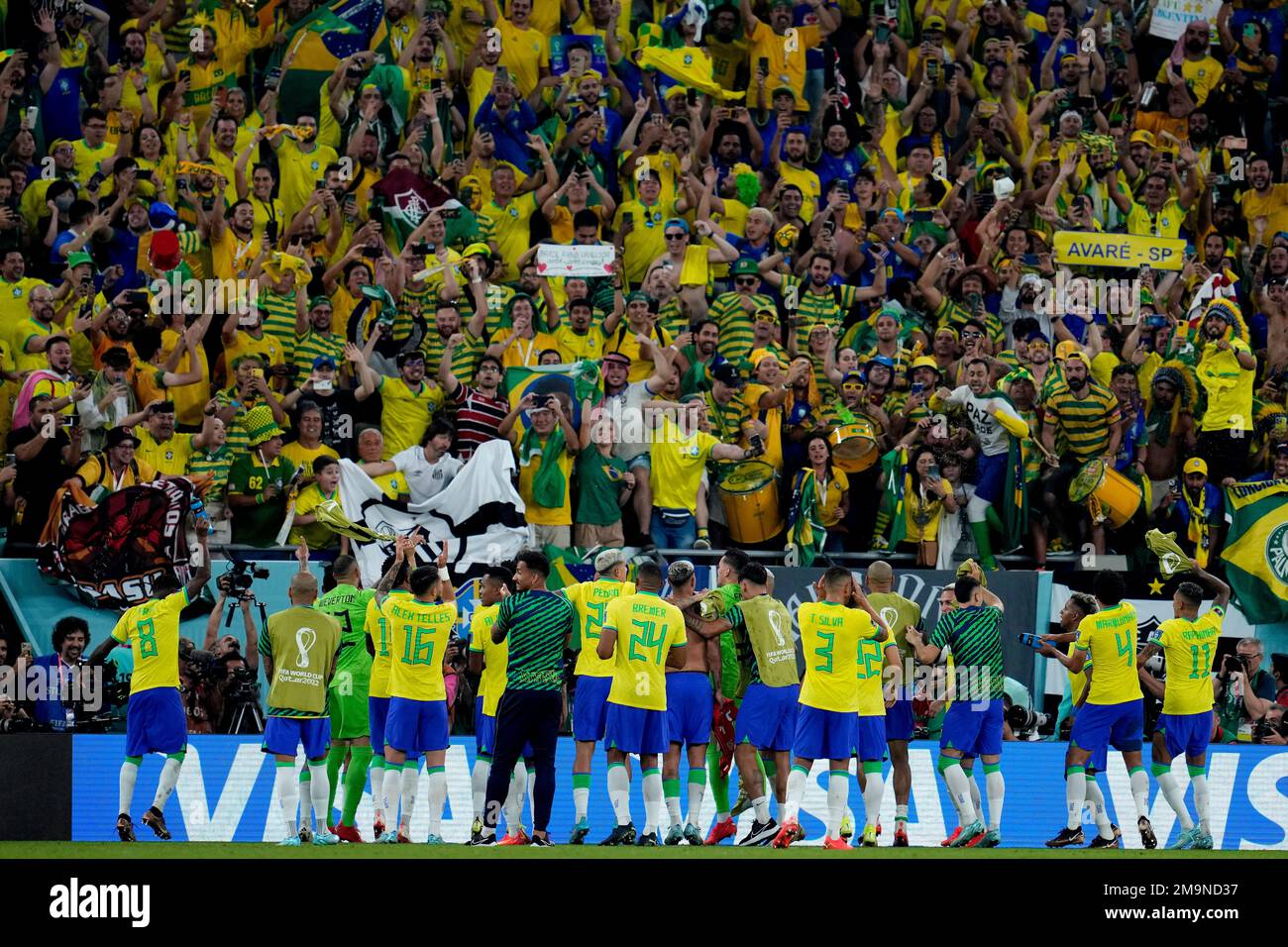 Brazil players celebrate with supporters after winning the World Cup ...