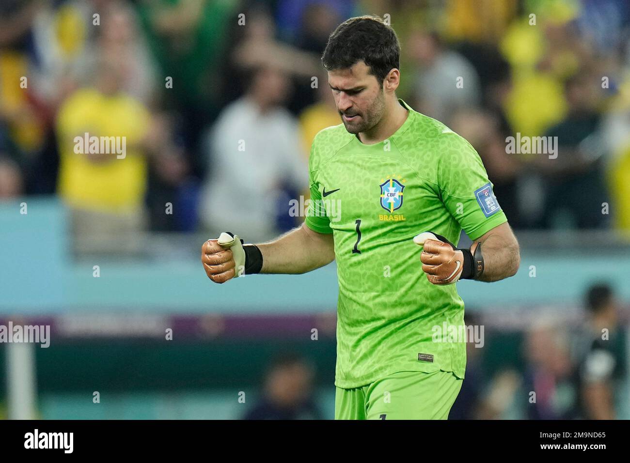 Brazil's goalkeeper Alisson celebrates after Casemiro scored the ...