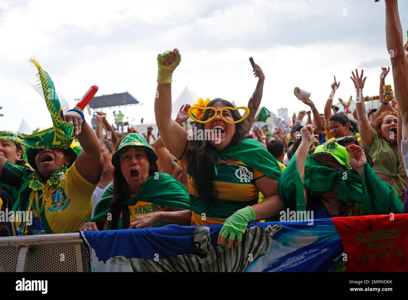 Brazil soccer fans celebrate their team's opening goal at a World Cup ...