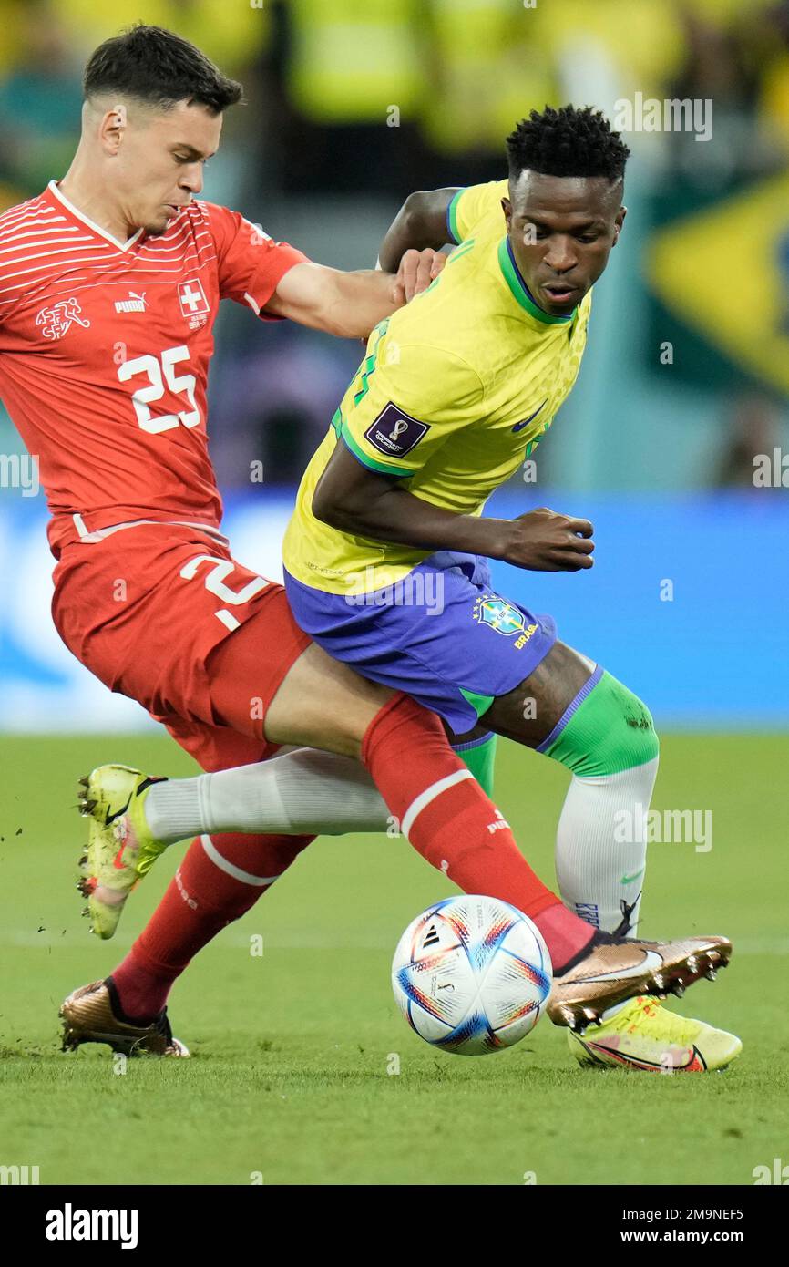 Brazil's Vinicius Junior, right, and Switzerland's Fabian Rieder ...