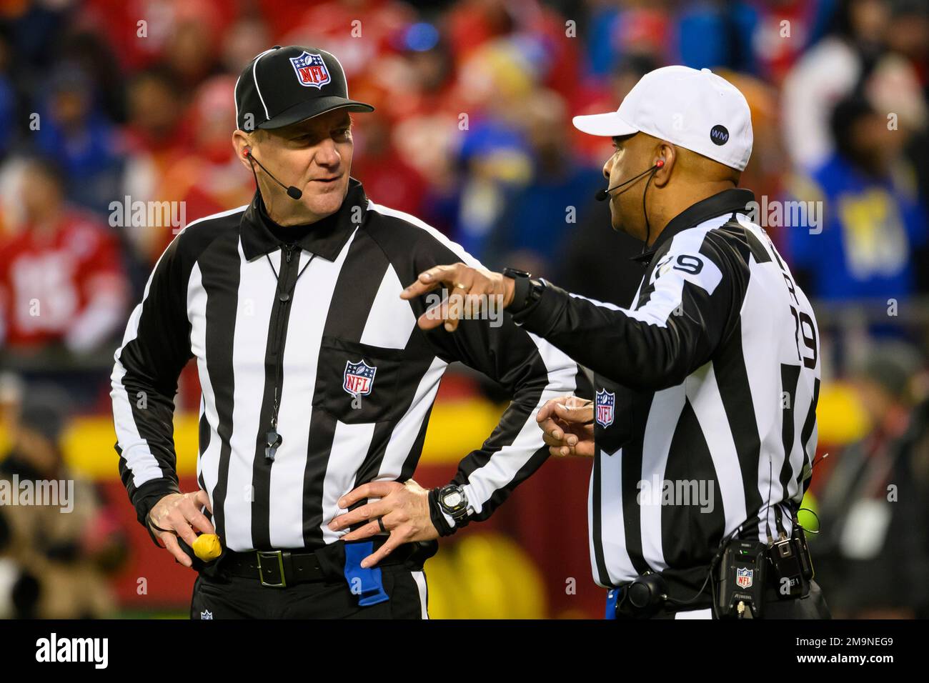 Down judge David Oliver, left and referee Adrian Hill (29) confer ...