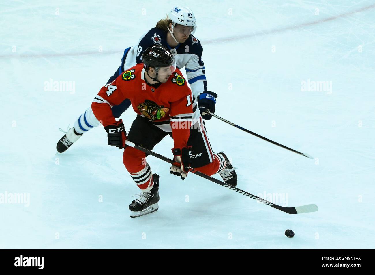 Chicago Blackhawks left wing Boris Katchouk (14) moves the puck against ...