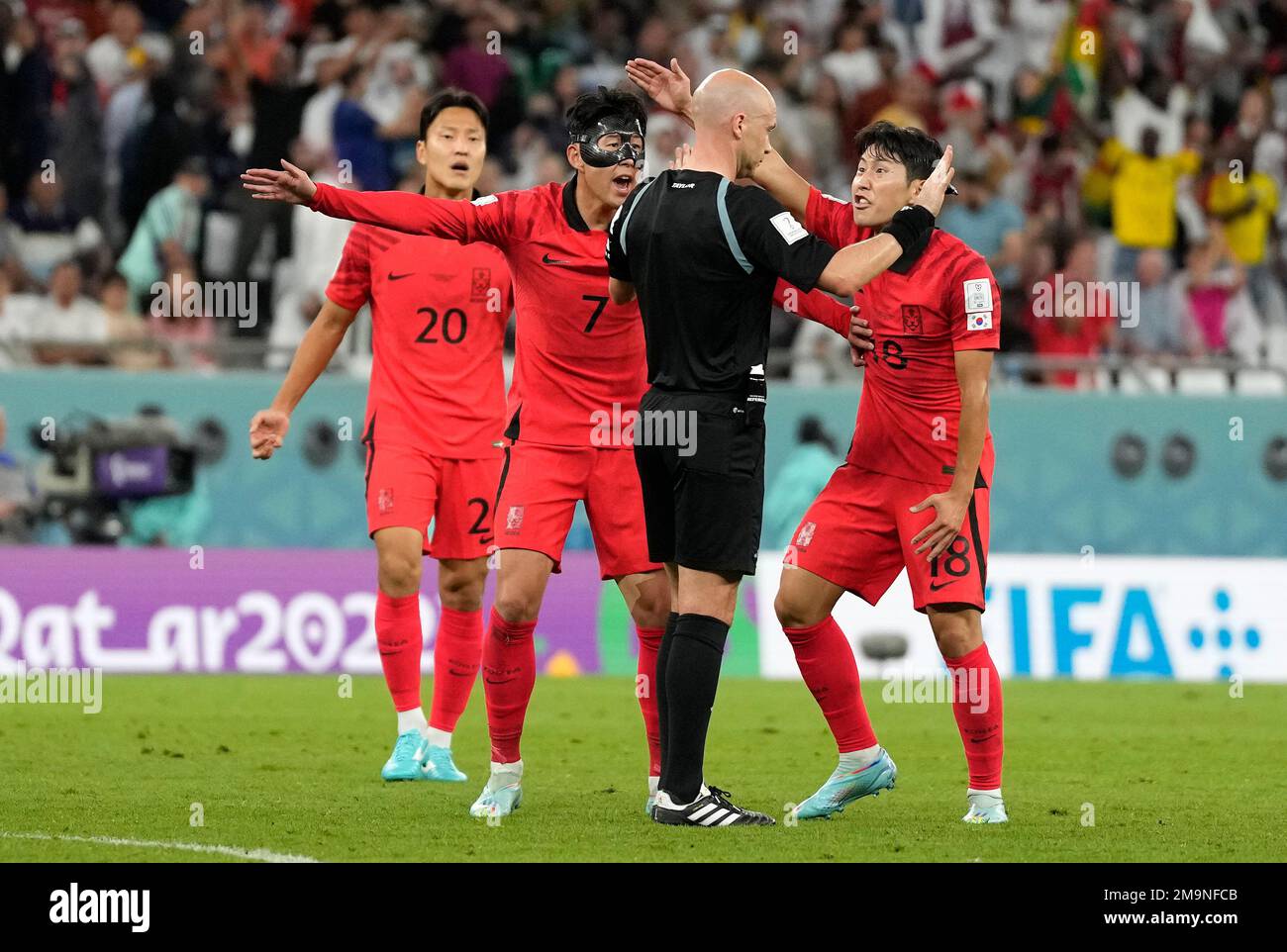 South Korea's Paik Seung-ho and South Korea's Son Heung-min talk to ...