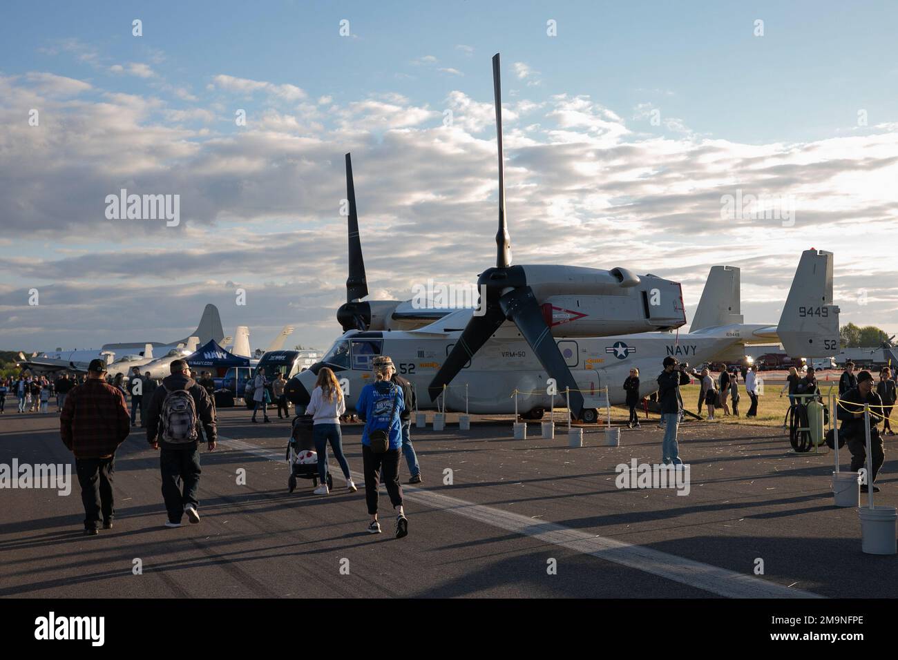 220520-N-OA487-1002 HILLSBORO (May 20, 2022) –Guests walk down the Navy ...