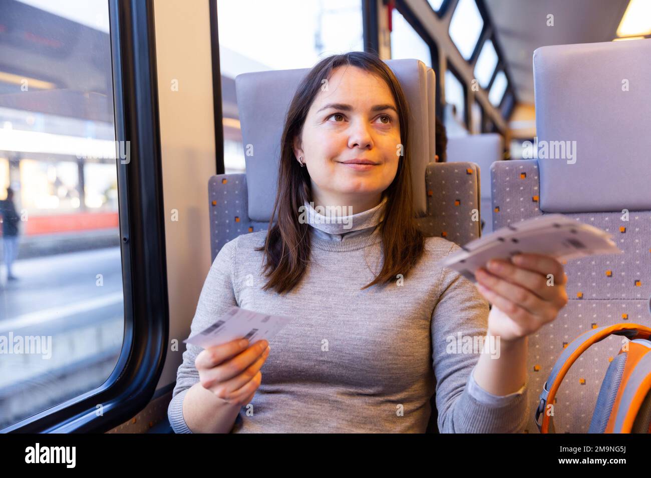 Woman and ticket inspector hi-res stock photography and images - Alamy
