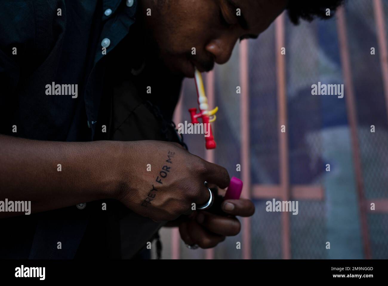 Vino, a 25-year-old drug addict who gave his first name only, smokes ...