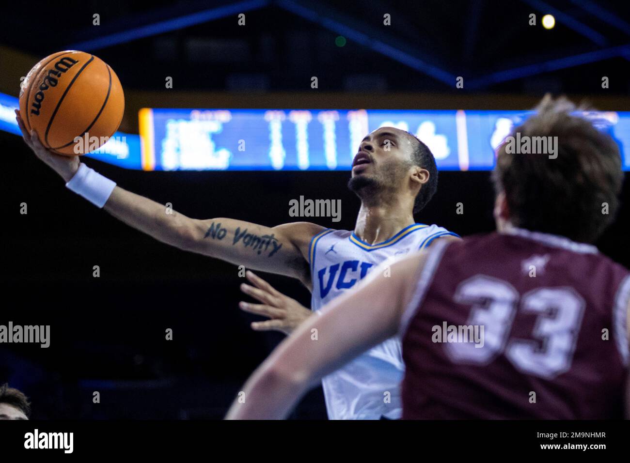 UCLA guard Amari Bailey, left, shoots against Bellarmine guard Ben ...