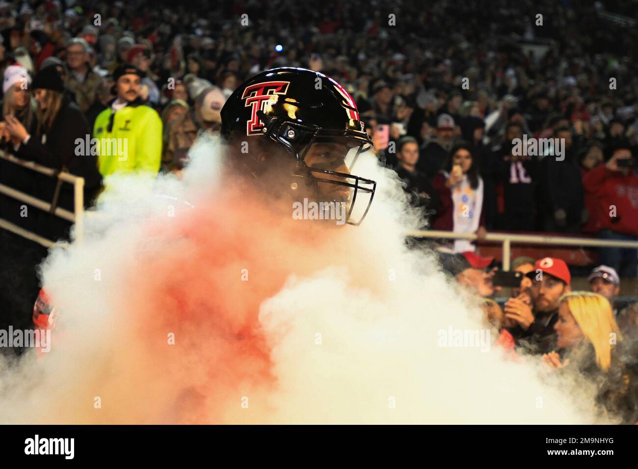 Texas Tech takes the field against Oklahoma before an NCAA college ...