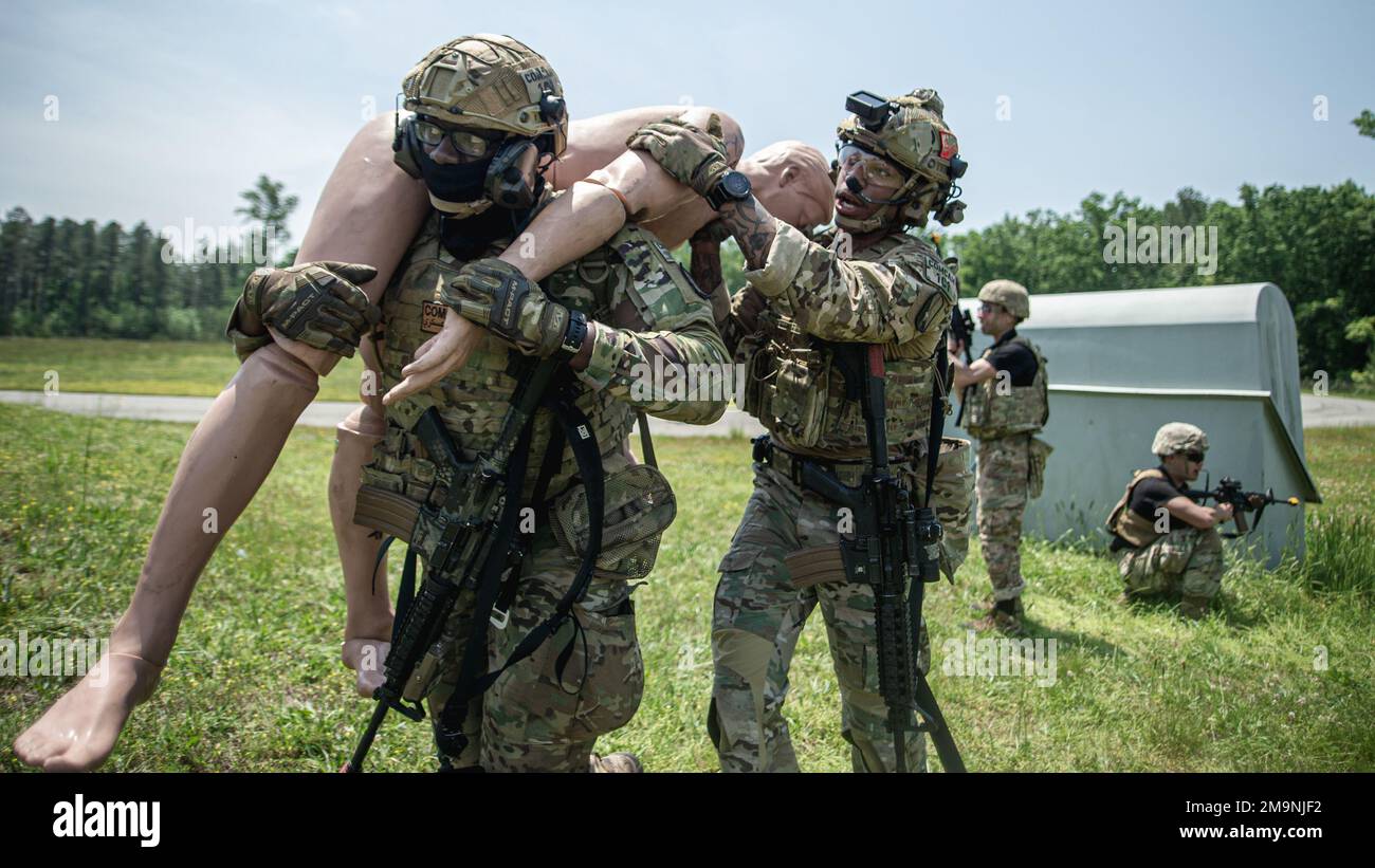 U.S. Army Sgt. Sidney Perry and Cpl. Trevor Franklin, assigned to 55th ...