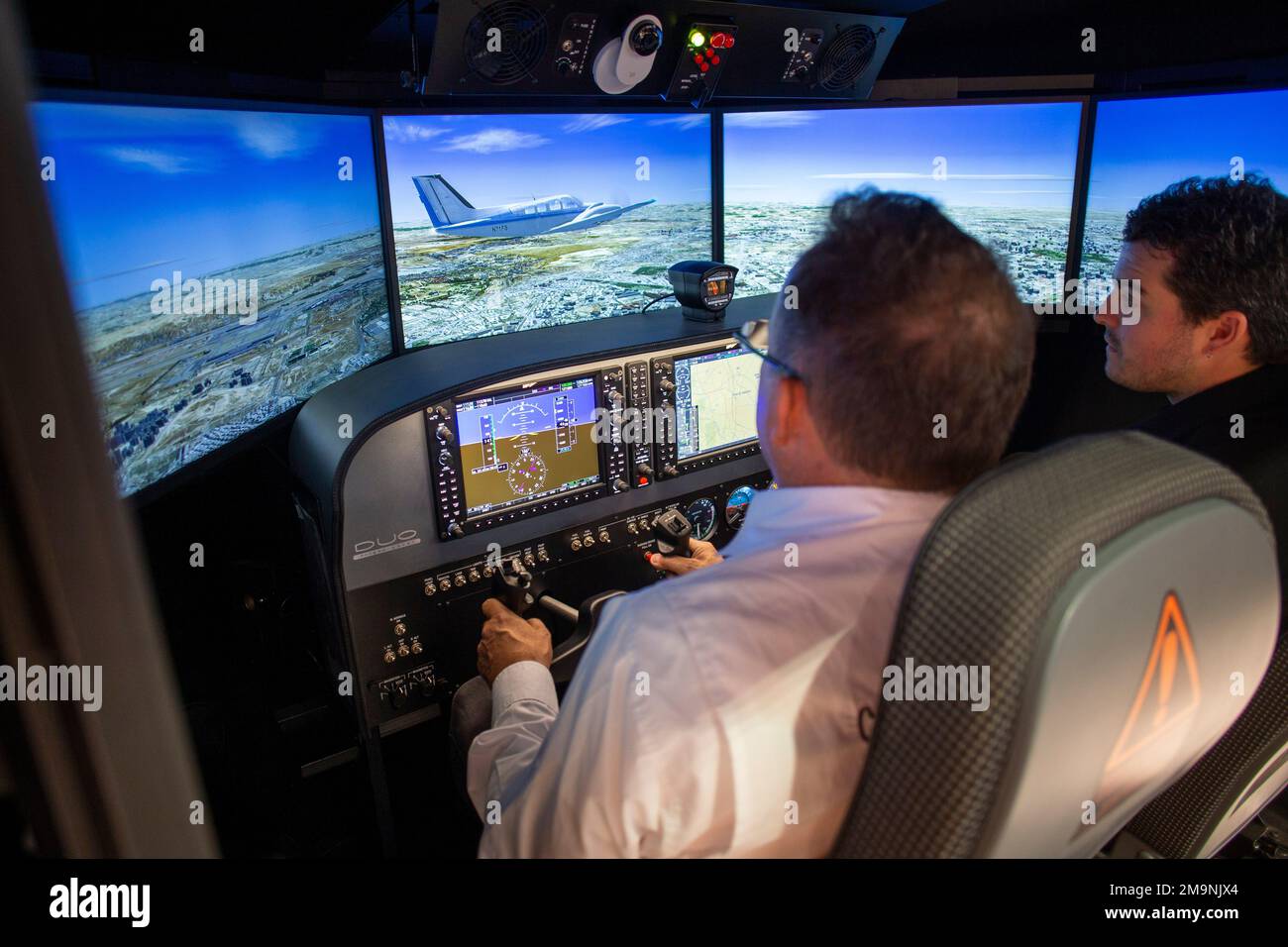 Madrid, Spain. 18th Jan, 2023. A visitor with an instructor inside an ...