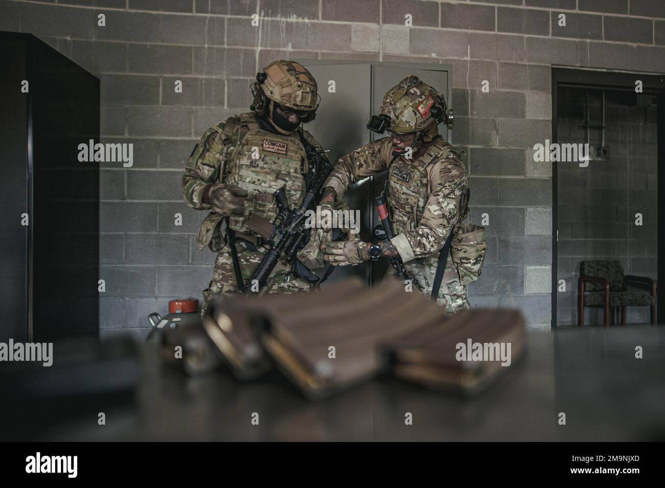 U.S. Army Sgt. Sidney Perry and Cpl. Trevor Franklin, assigned to 55th ...