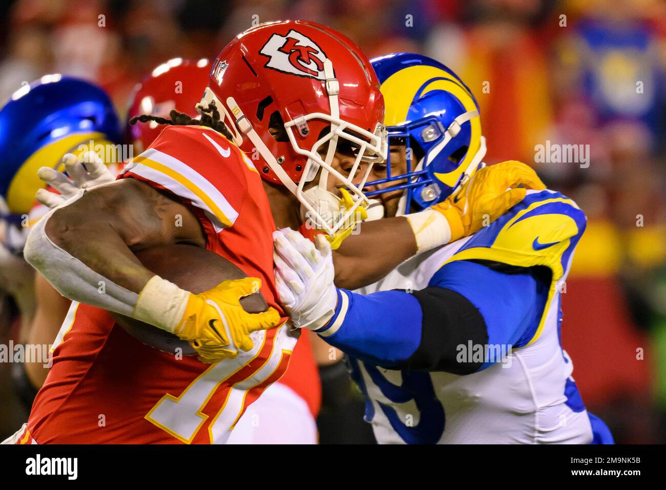 Kansas City Chiefs running back Isiah Pacheco (10) stiff-arms Los ...