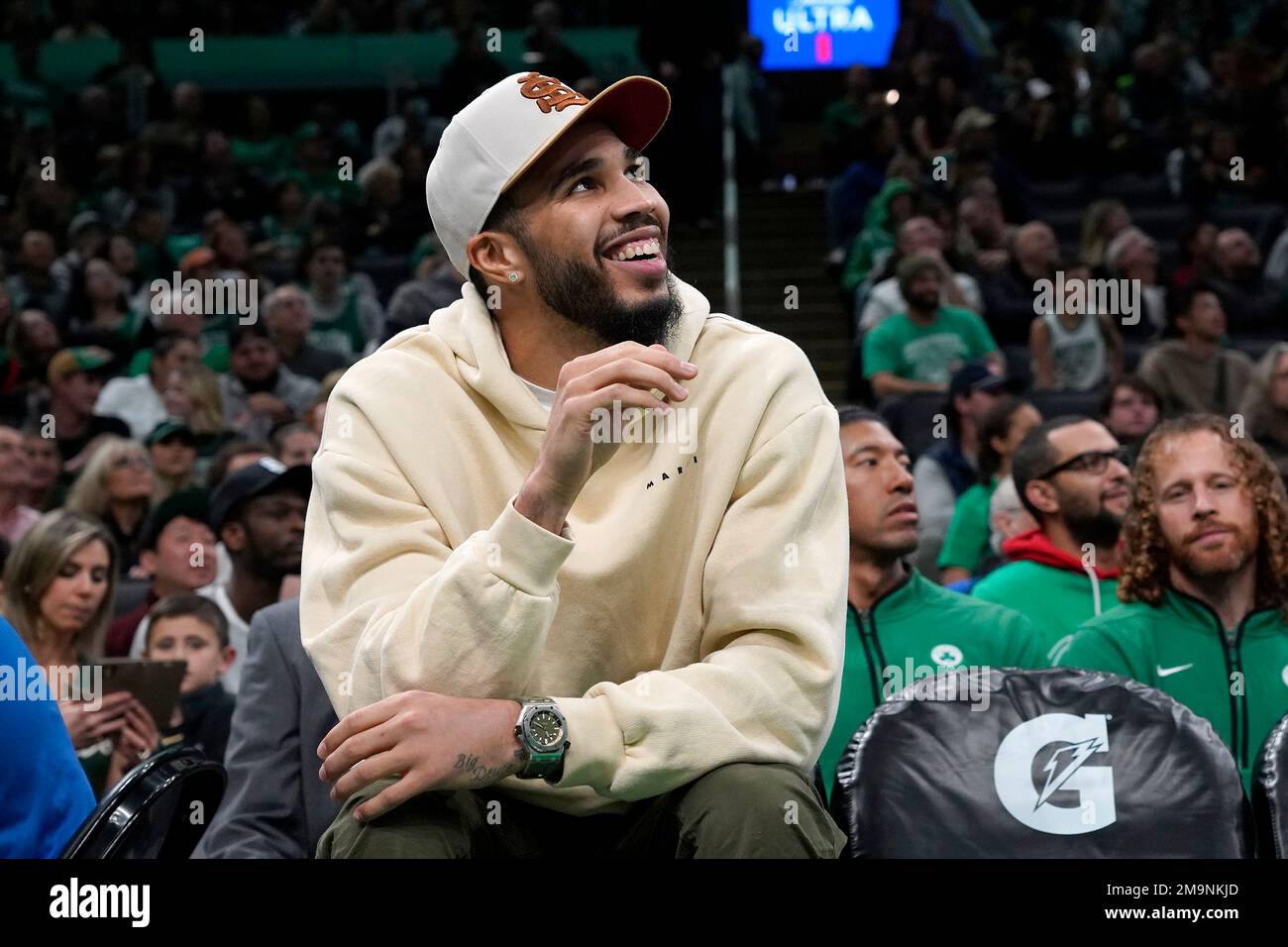 Boston Celtics forward Jayson Tatum watches from the bench during the ...