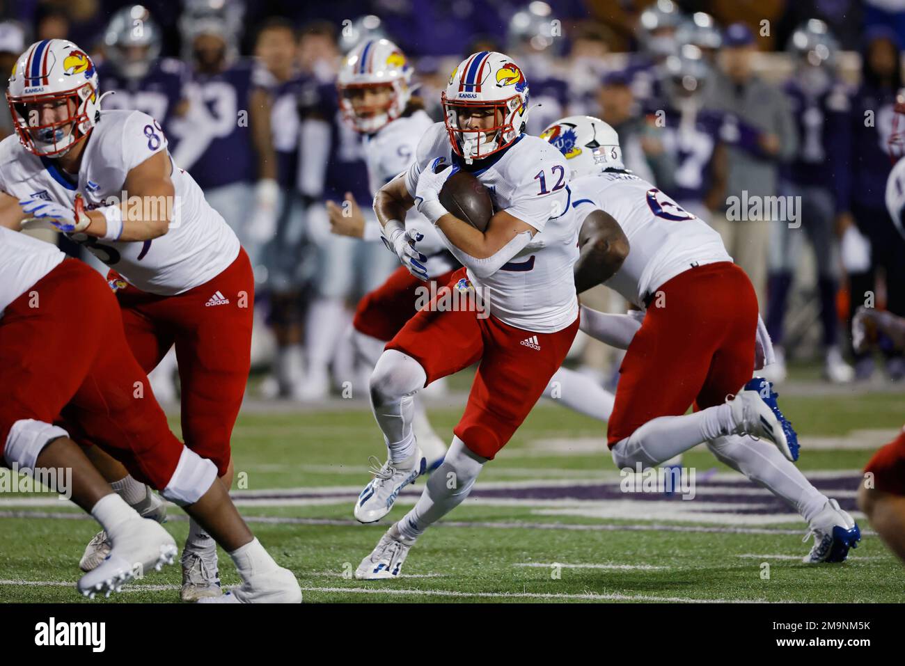 Kansas running back Torry Locklin (12) heads toward the end zone to ...