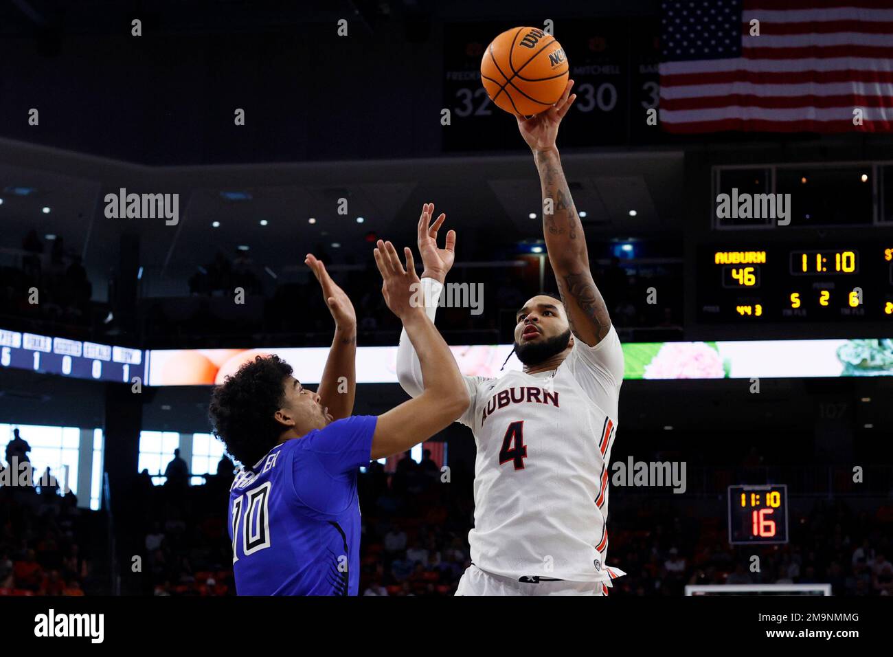 Auburn forward Johni Broome (4) shoots over Saint Louis forward Jake ...