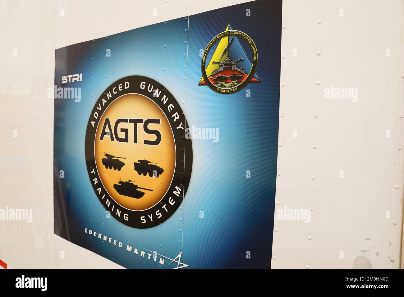 The poster for the Advanced Gunnery Training System on the trailer ...