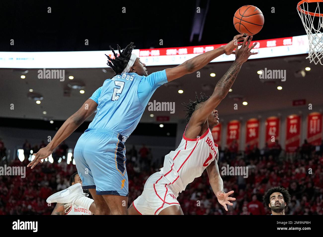 Kent State guard Malique Jacobs (2) tries to block Houston guard Marcus ...