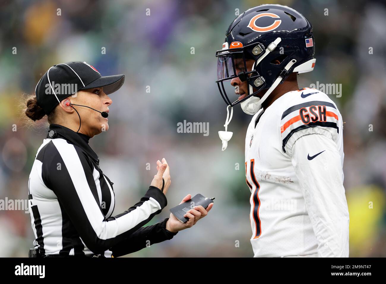 Chicago Bears wide receiver Darnell Mooney (11) talks to down judge ...