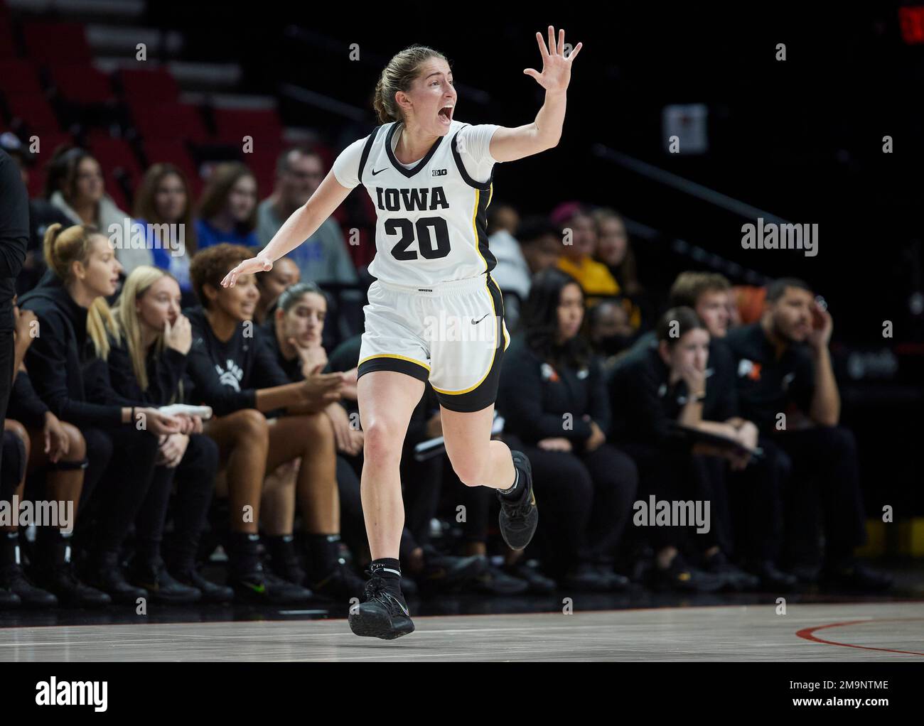 Iowa guard Kate Martin reacts after making a 3-point basket against ...