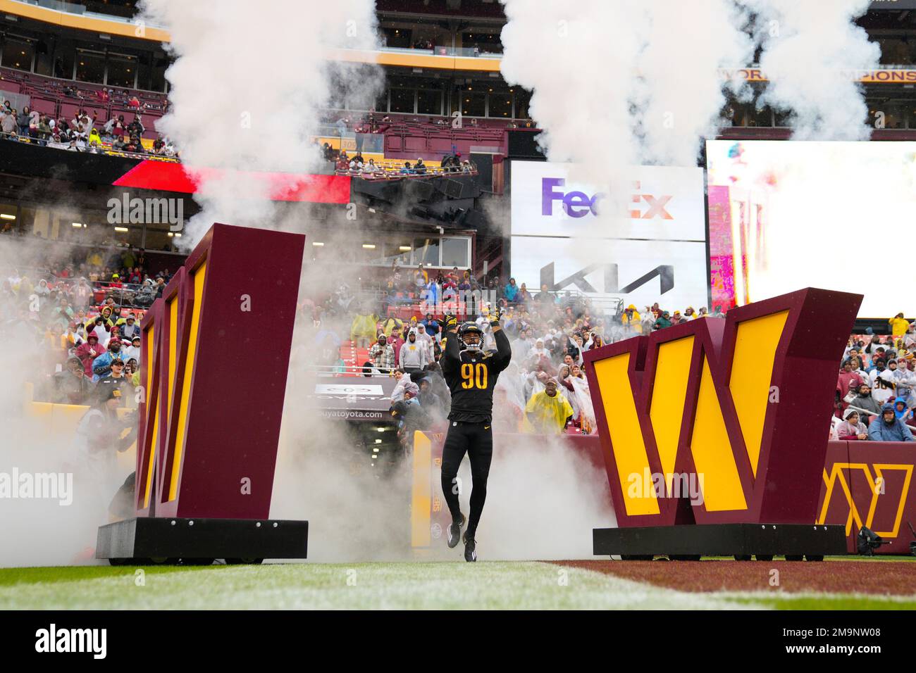 Washington Commanders defensive end Montez Sweat (90) taking the field ...