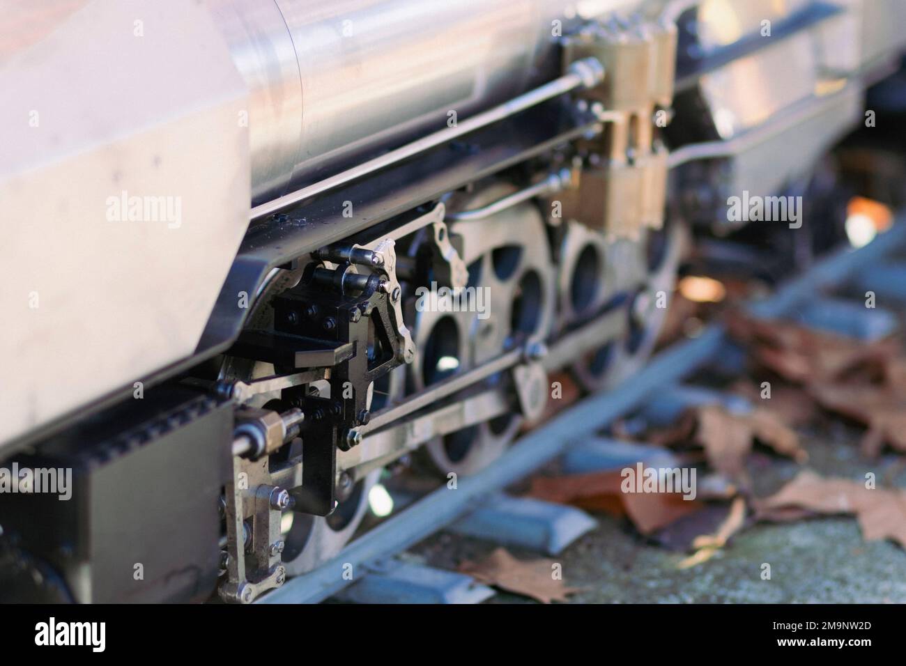 Iron steam train close up still on a railway from high up point of view ...