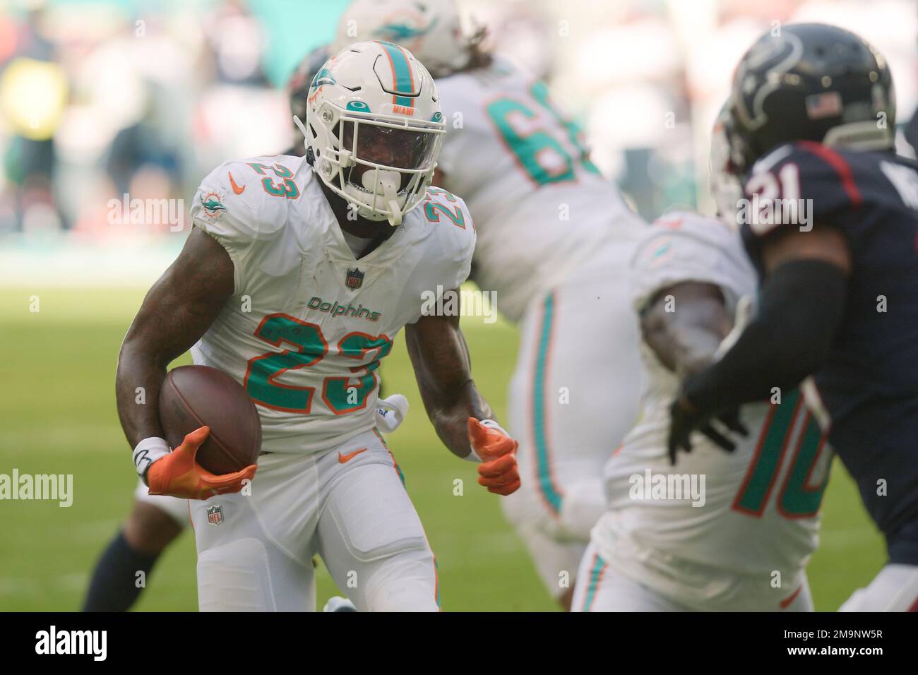 Miami Dolphins running back Jeff Wilson Jr. (23) runs a play during the first half of an NFL ...