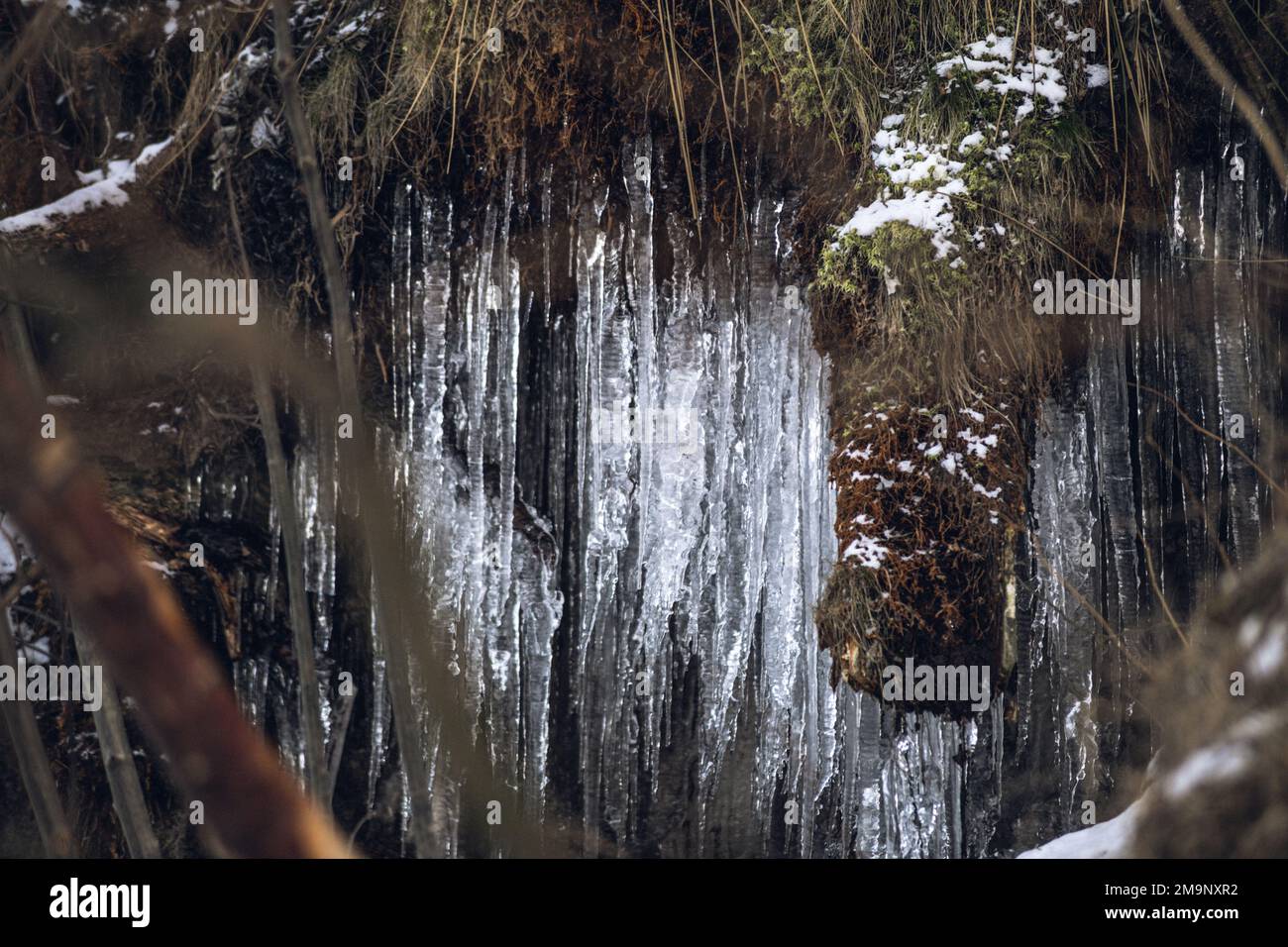 Icicles formed on frozen river hi-res stock photography and images - Alamy