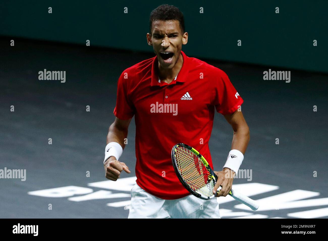 Canada's Felix Auger Aliassime reacts as he plays Australia's Alex de Minaur during the final ...