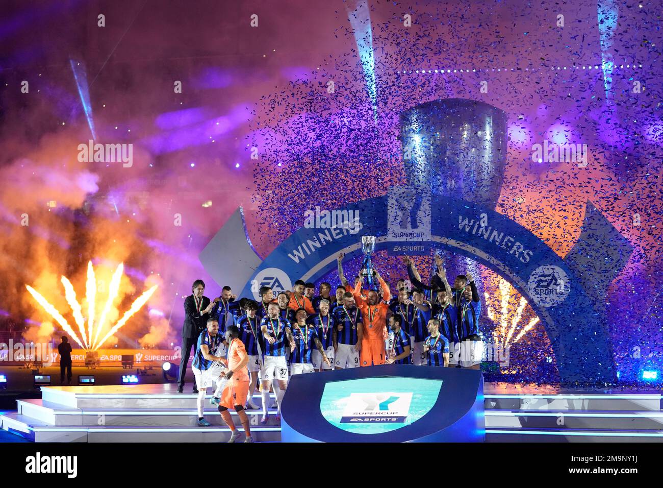Inter Milan's goalkeeper Samir Handanovic holds the trophy as he ...