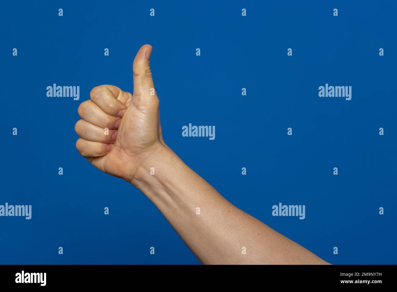 Thumb up hand sign. man's hand showing thumb up, like, ok, approval, accept, okay, good ...